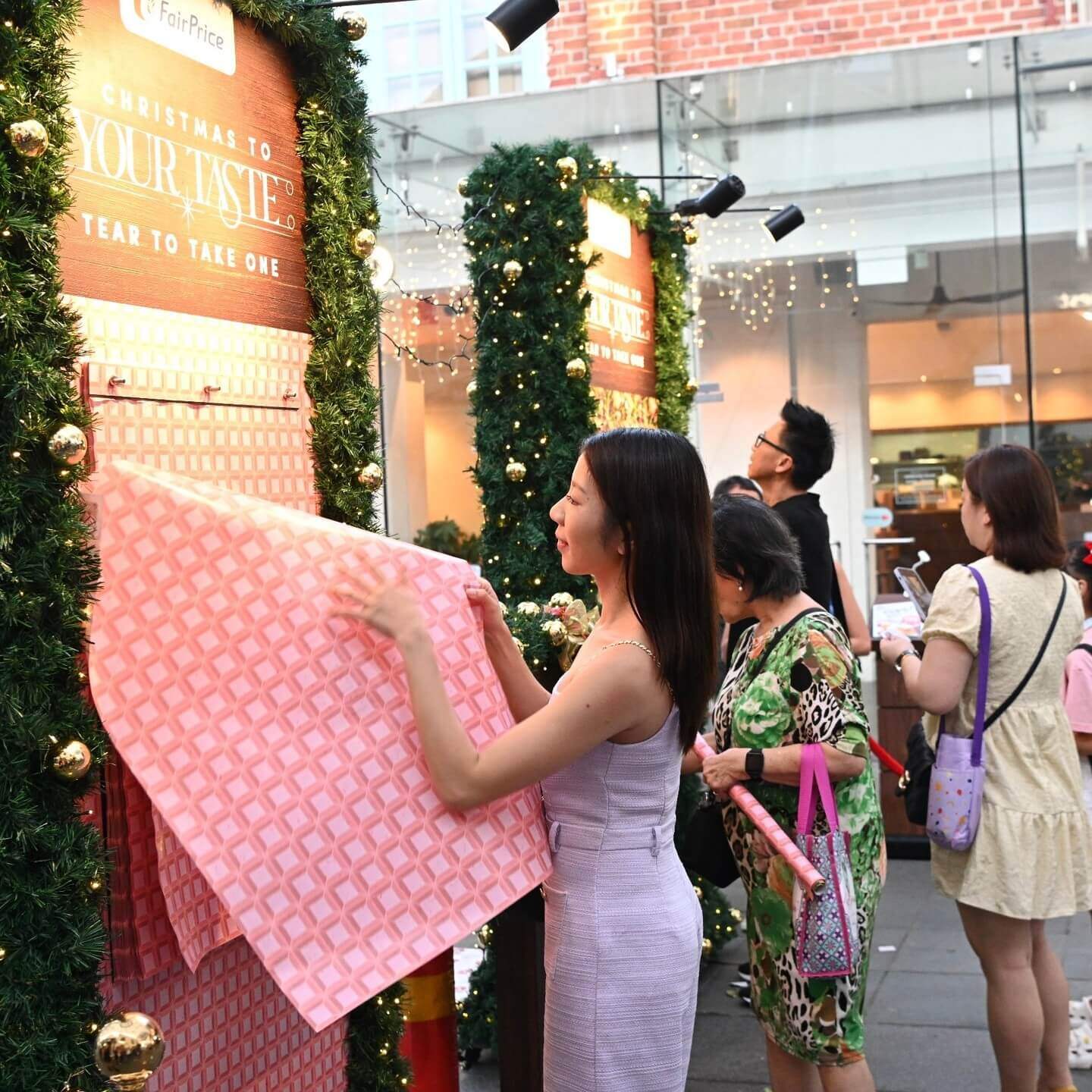 Passersby invited to rip food-scented gift wrap off grocery chain’s ...